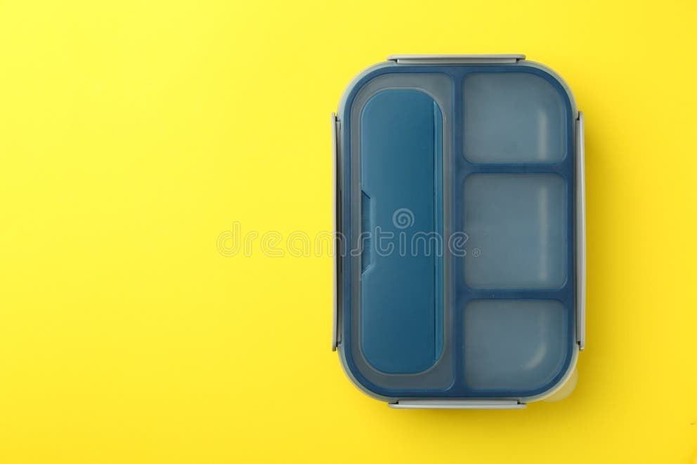 Empty Lunch Box on Yellow Background, Top View. Space for Text Stock ...