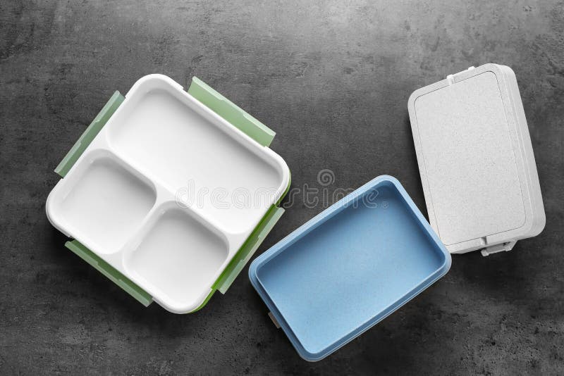 Empty lunch boxes on table stock photo. Image of table - 114251624