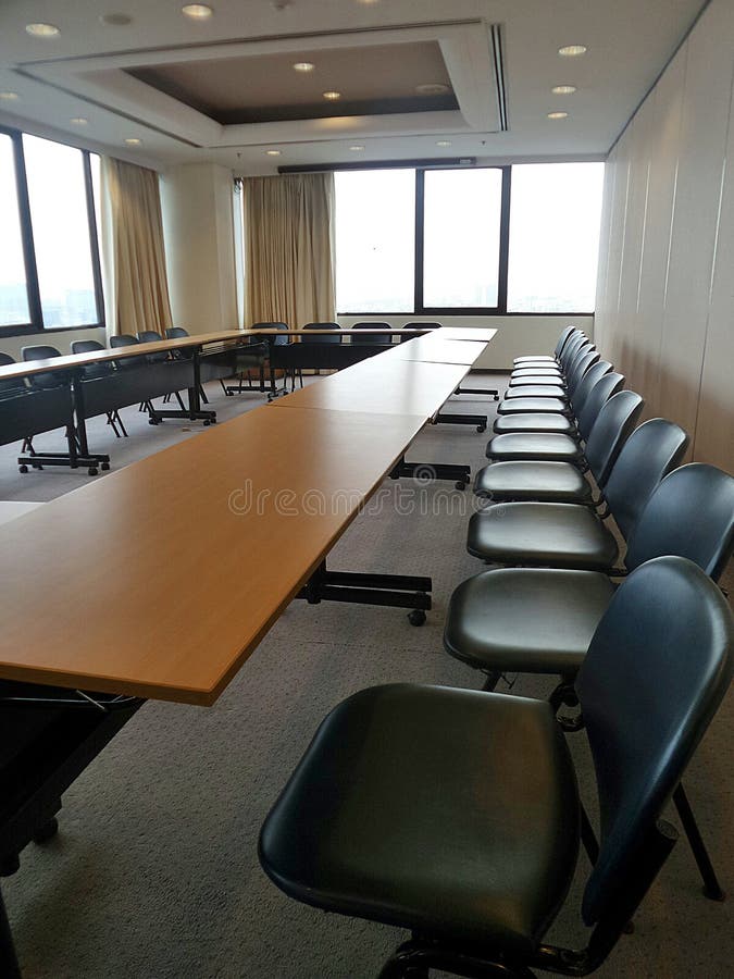 Long table in meeting room stock image. Image of briefing - 51866945