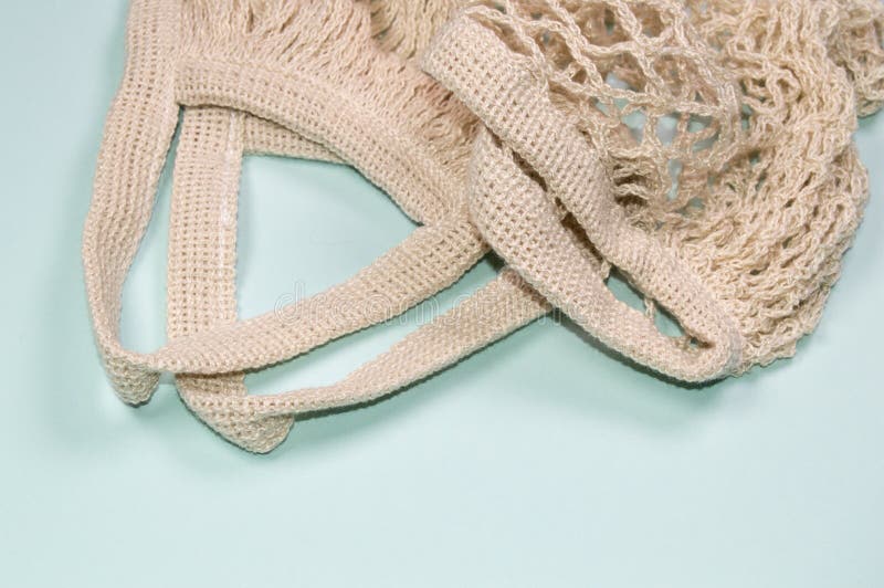 Empty Mesh Bag on a Blue Background, Top View. Space for Text, Eco ...