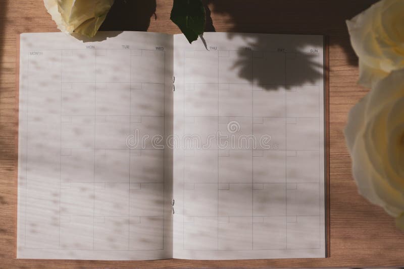 Empty Message in Schedule Book of Calendar with White Rose Stock Image ...
