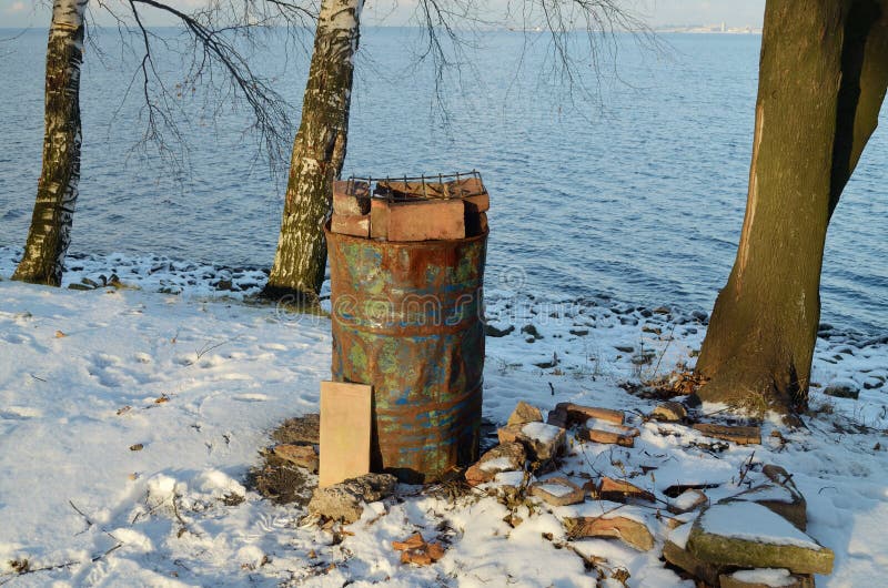 Empty metal barrel. stock photo. Image of snow, winter - 80826980