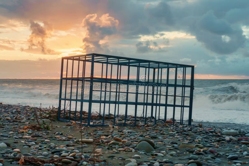 Empty Metal Cage on the Sunset Beach Stock Image - Image of iron ...