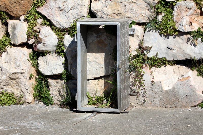 Empty Metal Utility Box Against Stone Wall with Vines Stock Photo ...