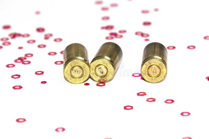 Empty 9mm Bullet Shells Over White Background with Red Hexagon Small ...