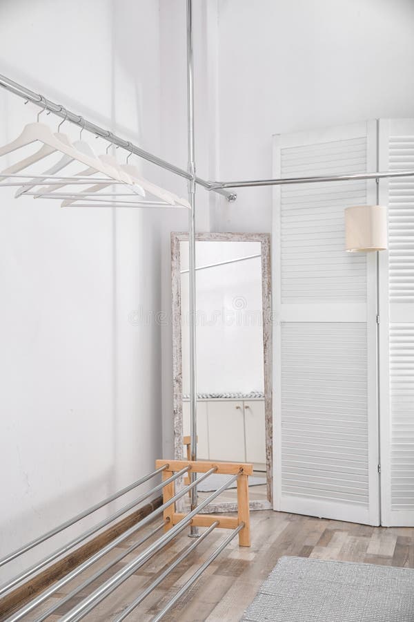 Empty Modern Dressing Room with Racks Stock Photo - Image of mirror ...