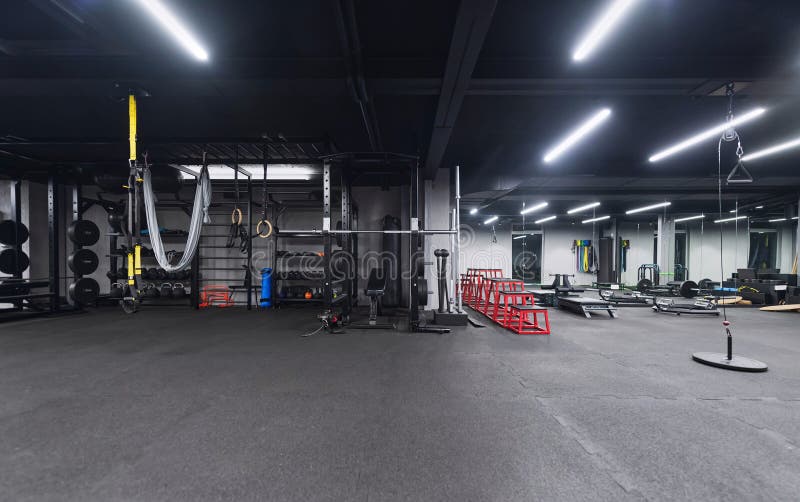 An Empty Modern Gymnasium with a Variety of Equipment, Offering a ...