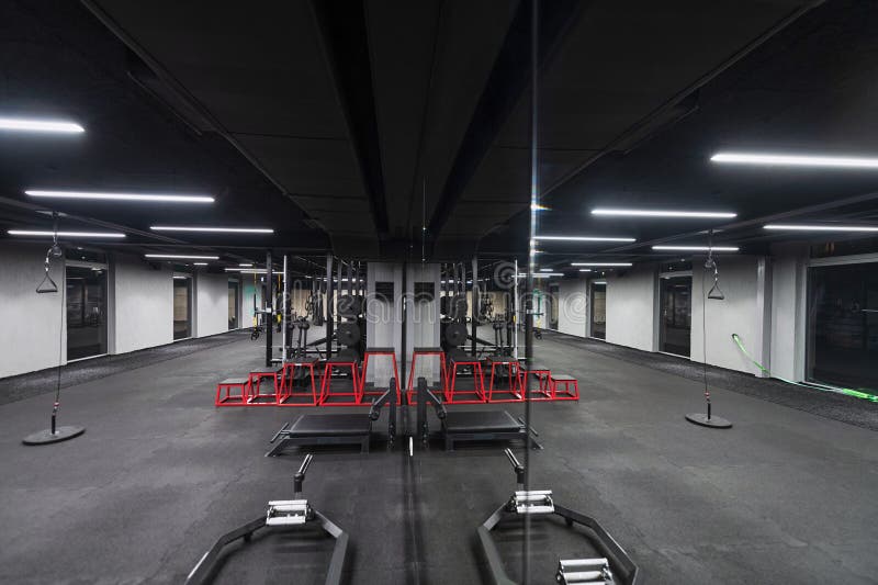 An Empty Modern Gymnasium with a Variety of Equipment, Offering a ...