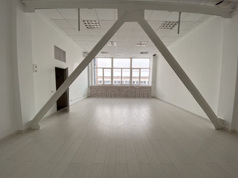 Empty Modern Loft Room with Large Windows and Structural Beams ...