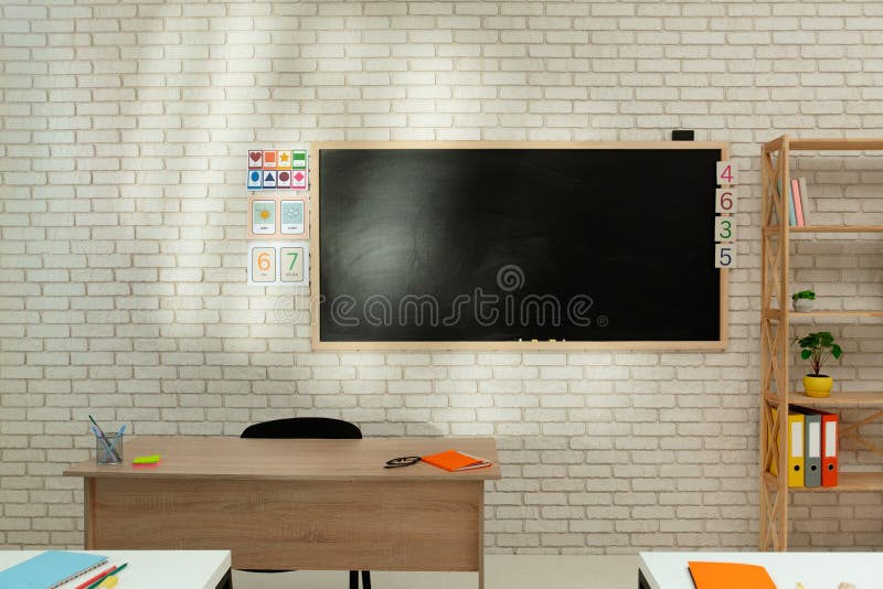 Empty Modern School Classroom with Desks, Chairs and Chalkboard at ...