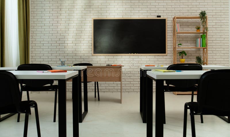 Empty Modern School Classroom with Desks, Chairs and Chalkboard at ...