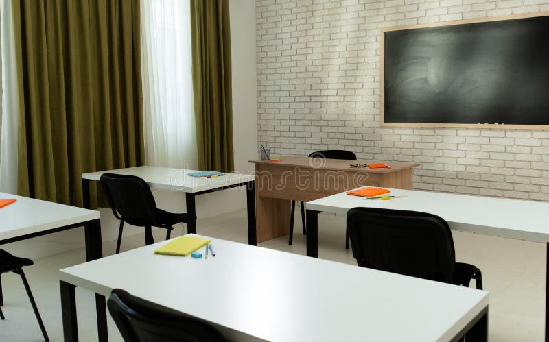 Empty Modern School Classroom with Desks, Chairs and Chalkboard at ...