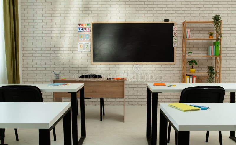 Empty Modern School Classroom with Desks, Chairs and Chalkboard at ...