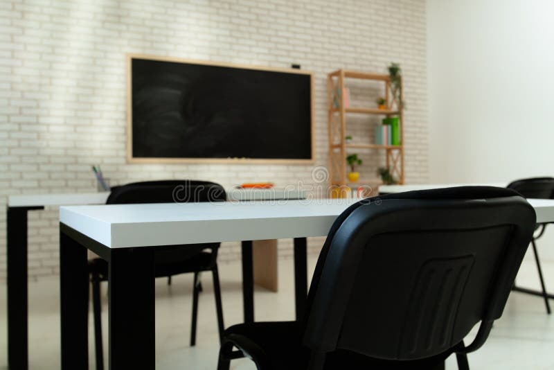 Empty Modern School Classroom with Desks, Chairs and Chalkboard at ...