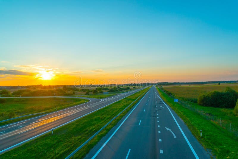 Empty motorway at sunset stock image. Image of travel - 270168203