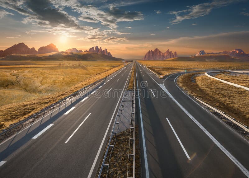 Empty Motorway through Vastness at Idyllic Sunset Stock Photo - Image ...