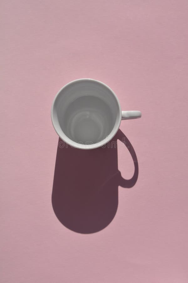 Empty Mug with Shadow on a Pink Background Stock Photo - Image of ...