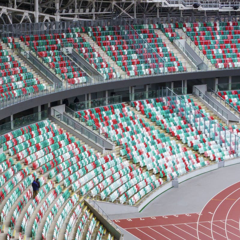 Empty Multi-colored Plastic Seats with Numbers and a Piece of Sports ...