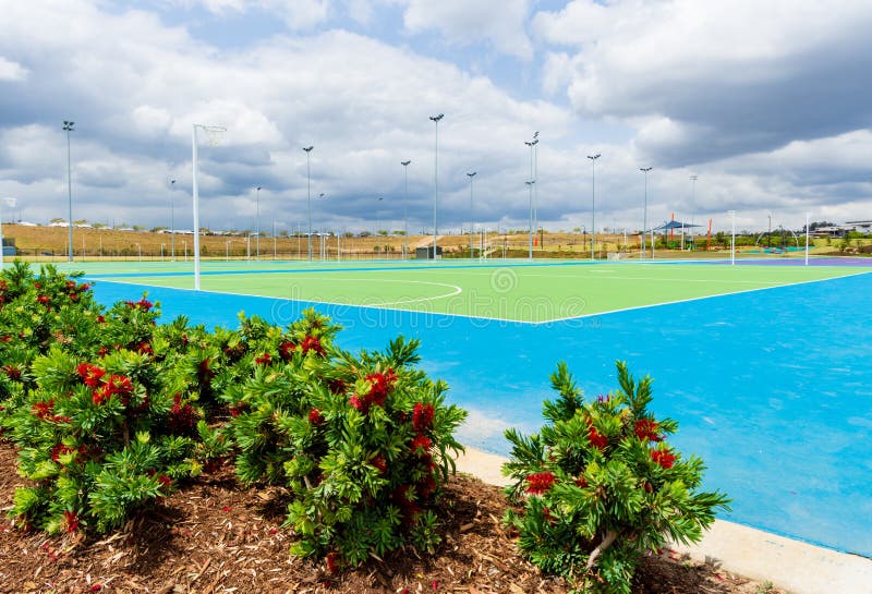 Empty Netball Courts stock image. Image of clouds, plant - 161134299