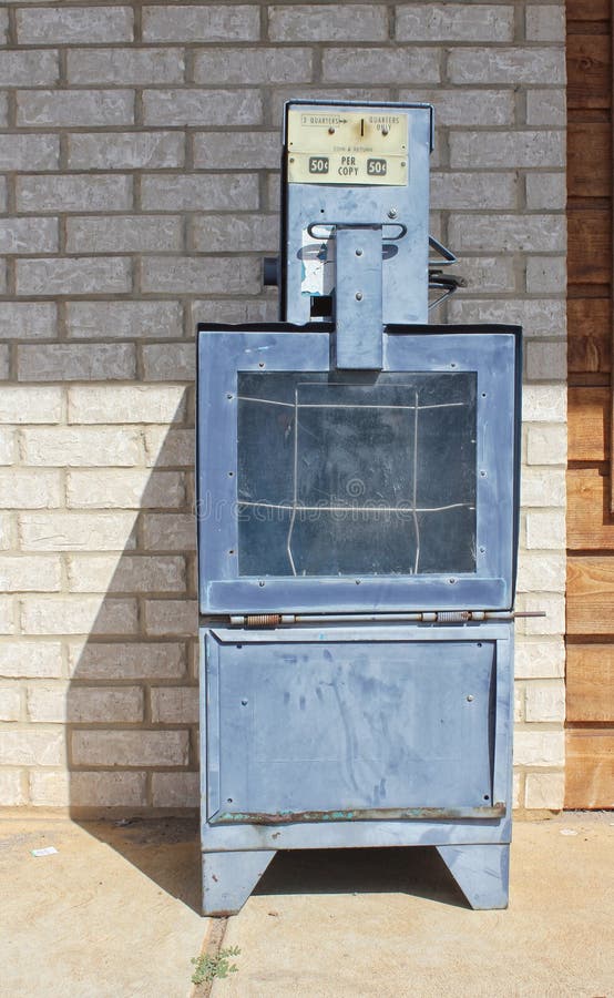 Empty Newspaper Vending Machine on Sidewalk Near Store Building Stock ...