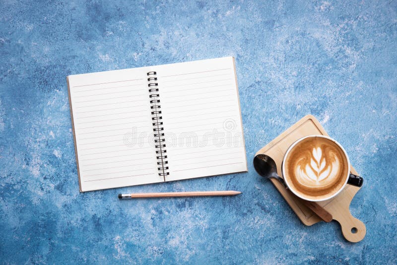 Empty Notebook with Cup of Coffee Latte on Blue Abstract Background ...