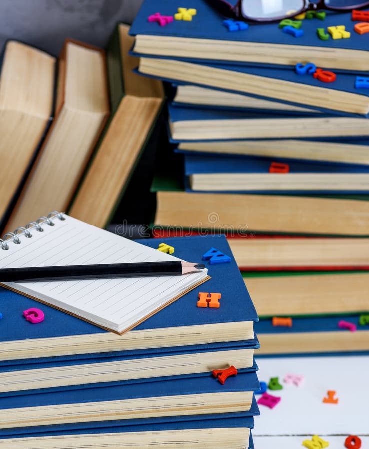 Empty Notebook with White Sheets and Many Different Books Stock Image ...