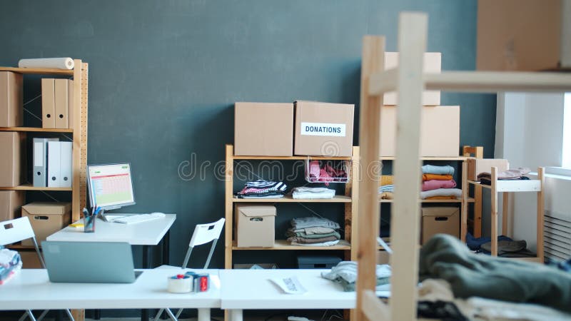Empty Office of Charity Organization with Donation Boxes and No People ...