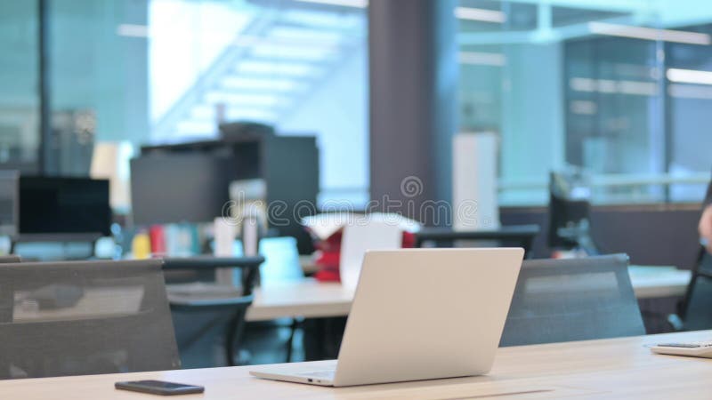 Empty Office with Open Laptop on Desk Stock Photo - Image of starting ...