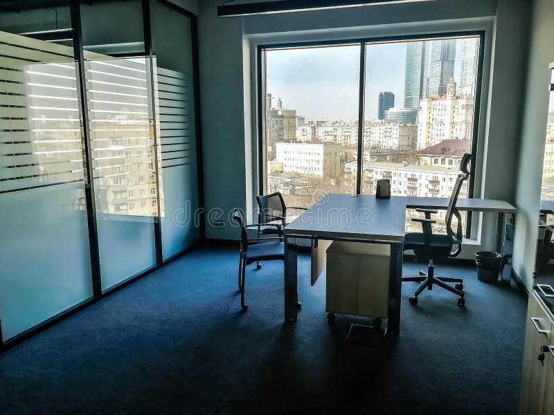 Empty Office with a Table and Three Chairs with a Panoramic View of the ...