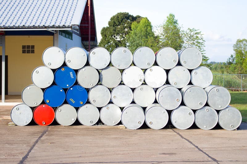 Empty Oil Gallons in a Gas Station Stock Image - Image of metal, rusty ...