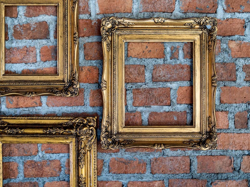 Empty Old Ornate Golden Frames Hanging on Brick Wall Stock Photo ...