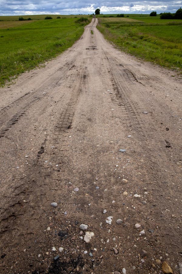 An empty old paved road stock photo. Image of traffic - 244581888