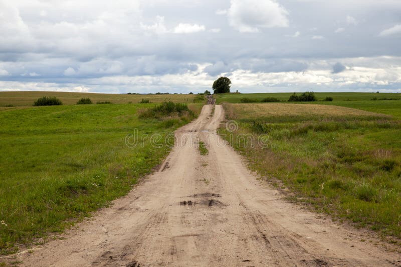 An empty old paved road stock photo. Image of journey - 244582448