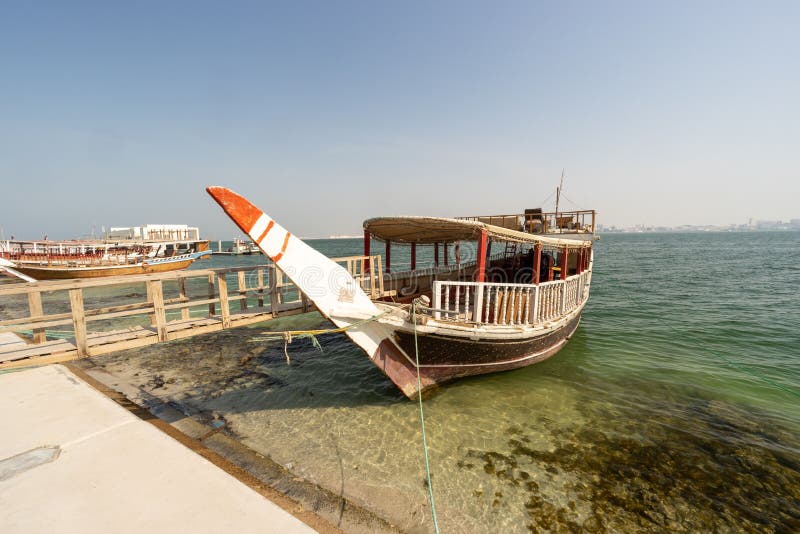 Row of Empty Old Traditional Dhow Ships Docked by the Shore at Doha ...