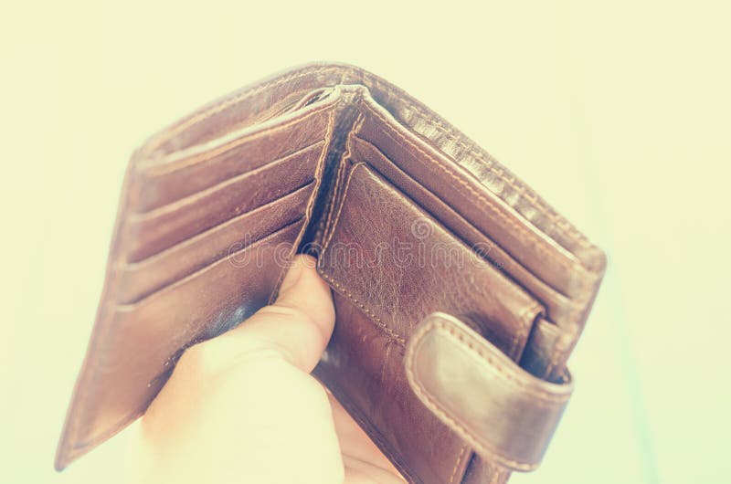 Empty Open Brown Purse in One Hand. Stock Photo - Image of isolated ...