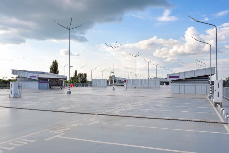 Empty Open Parking Lot for Cars on the Background of the Sky. Empty ...