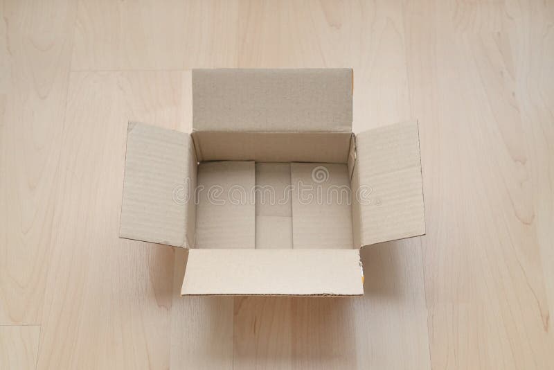 Empty Open Rectangular Cardboard Box on Wood. Shopping Online Ob Stock ...