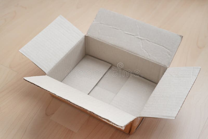 Empty Open Rectangular Cardboard Box on Wood. Shopping Online Ob Stock ...