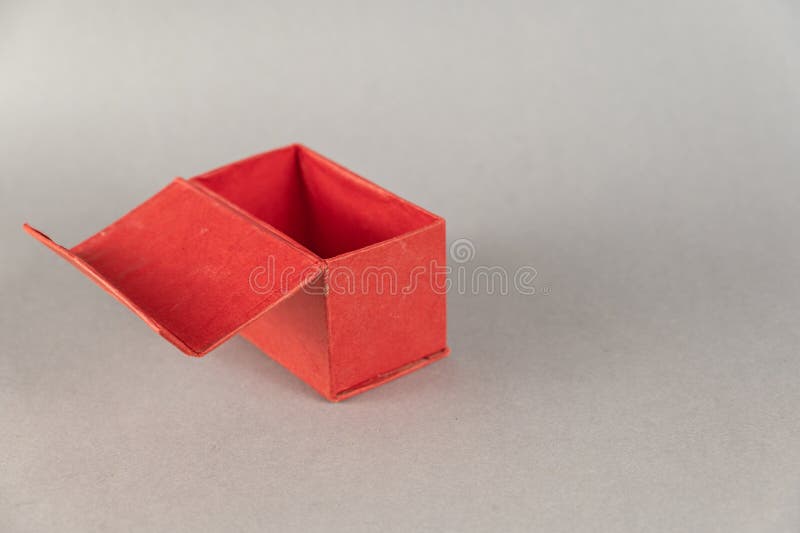 Empty Open Red Rectangular Box on Gray Background. Close-up Stock Photo ...