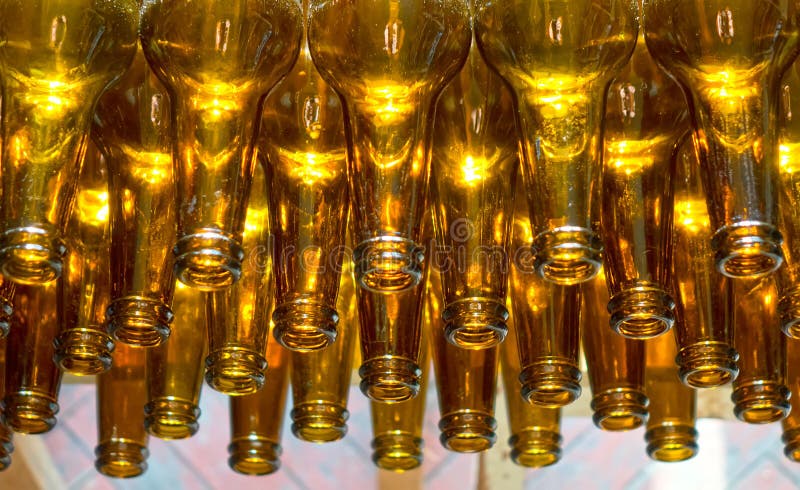 Empty Orange Beer Glass Bottles Necking Down Stock Image - Image of ...