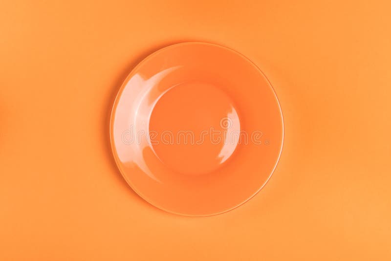 Empty Orange Plate on Orange Stock Photo - Image of table, menu: 170638636