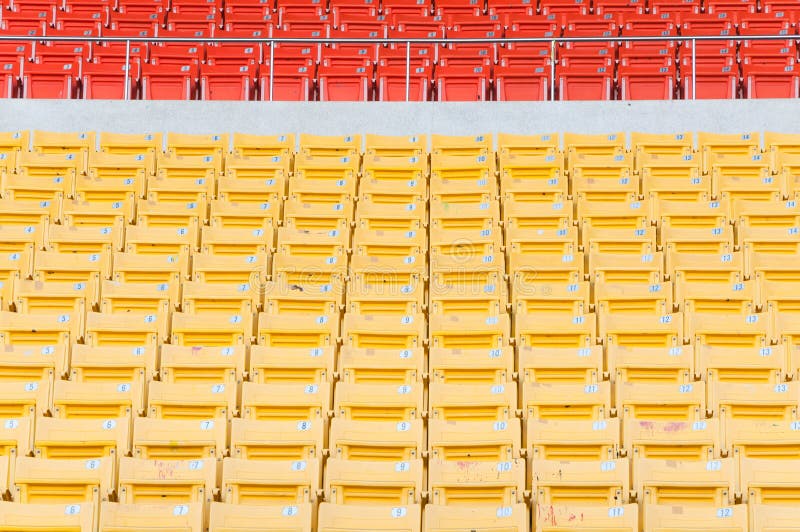 Empty Orange and Yellow Seats at Stadium Stock Photo - Image of lines ...