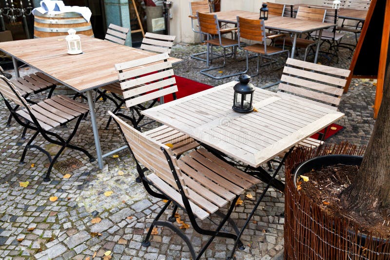 Empty Outdoor Restaurant Tables Stock Image - Image of autumn, town ...