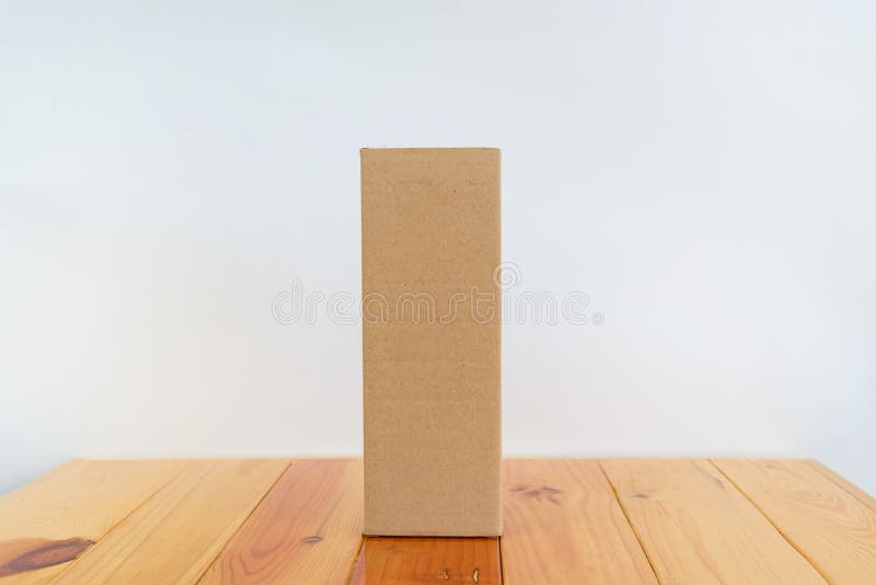 Empty Package Brown Cardboard Box for Long Items on Wooden Table Stock ...