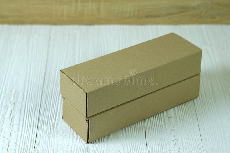 Empty Package Brown Cardboard Box or Tray on Bright Wooden Table Stock ...