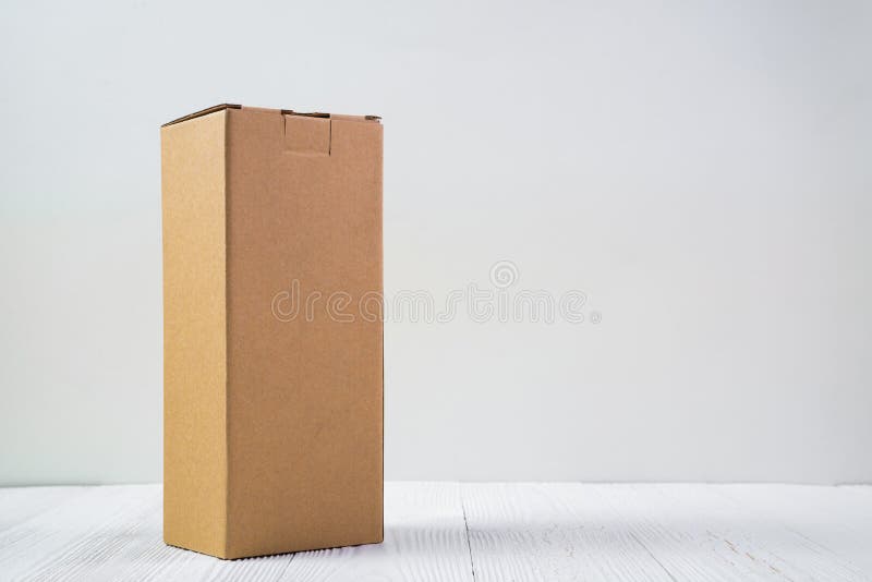 Empty Package Brown Cardboard Box or Tray on Bright Wooden Table Stock ...