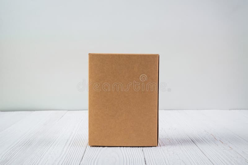 Empty Package Brown Cardboard Box or Tray on Bright Wooden Table Stock ...