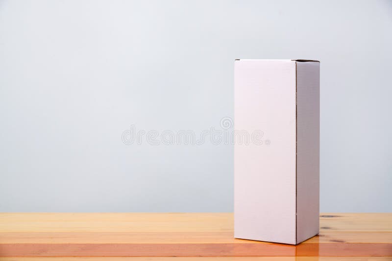 Empty Package White Cardboard Box for Long Items on Wooden Table Stock ...