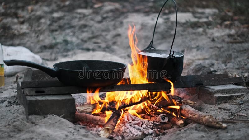 Empty Pan and Boiling Pot Over Campfire Stock Video - Video of offgrid ...