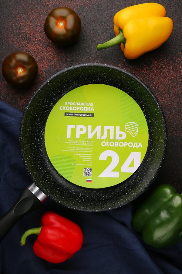 Empty Pan with Ingredients. Cast Iron Pan and Vegetables on Black Metal ...